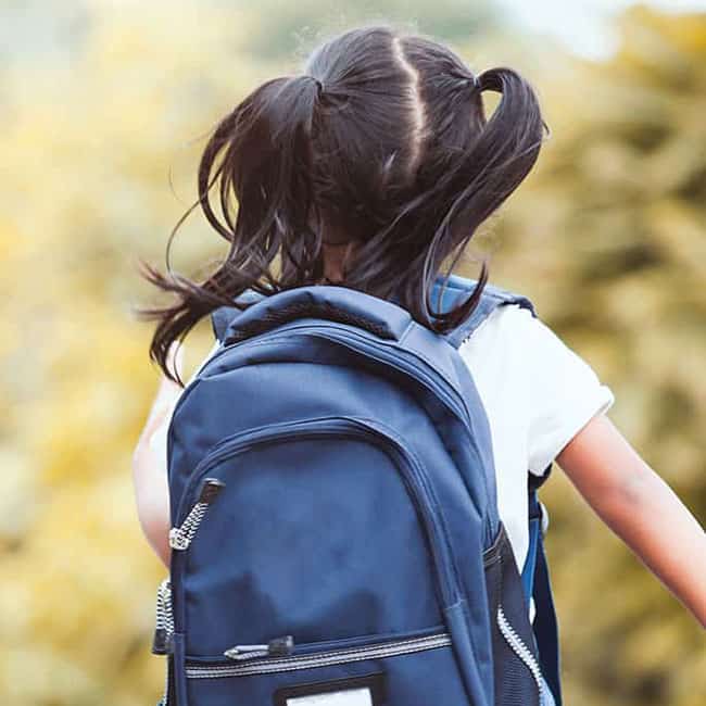 Schoolgirl with Backpack