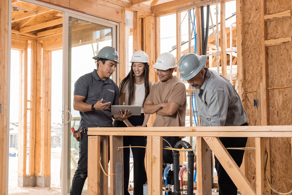 construction walk through with homeowners and construction team